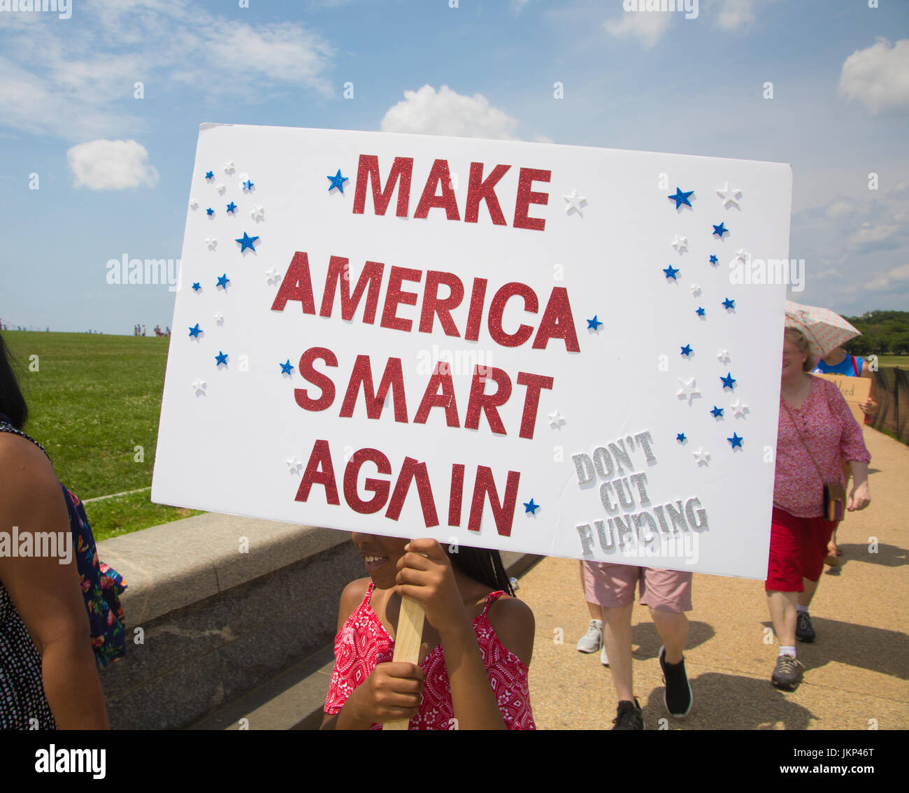 "Make America Smart Again" says this young demonstrator at the "March ...