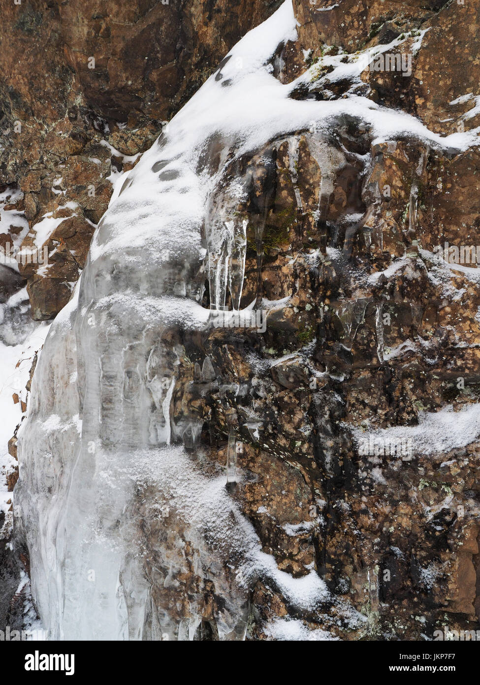 Ice on the rocks Stock Photo - Alamy