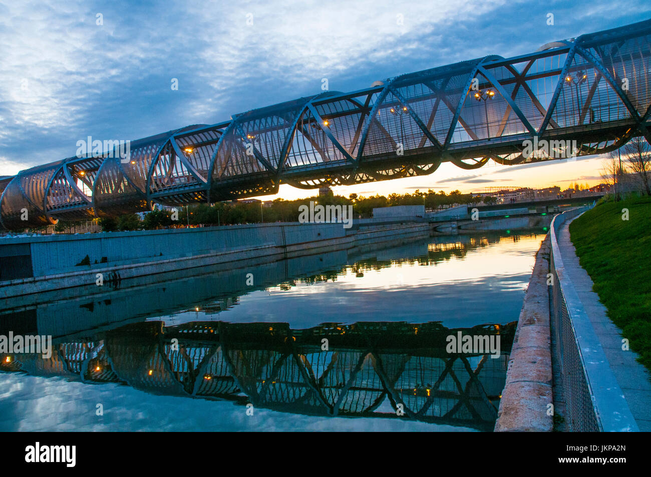 Perrault bridge and river Manzanares at nightfall. Madrid Rio park ...