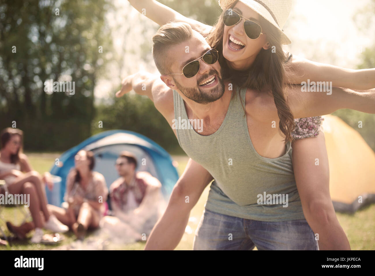 Couple spending weekend with their friends Stock Photo - Alamy
