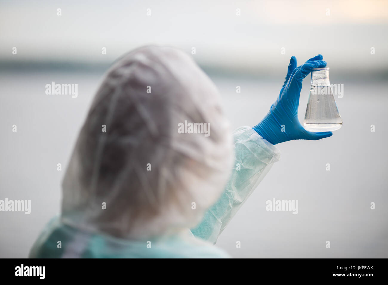 Photo lab assistant from back Stock Photo - Alamy