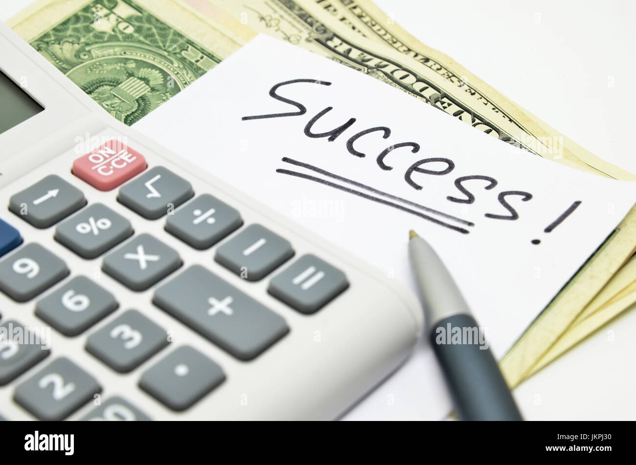 Hand written success word on paper. Business success concept Stock ...