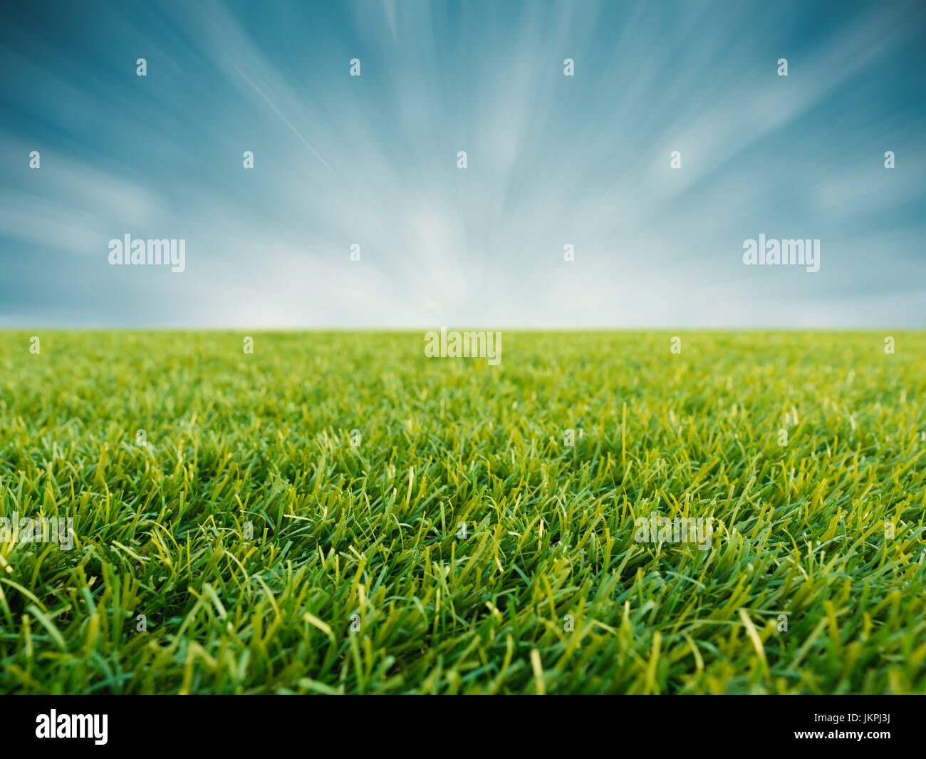 green grass or turf on blue abastract background Stock Photo - Alamy