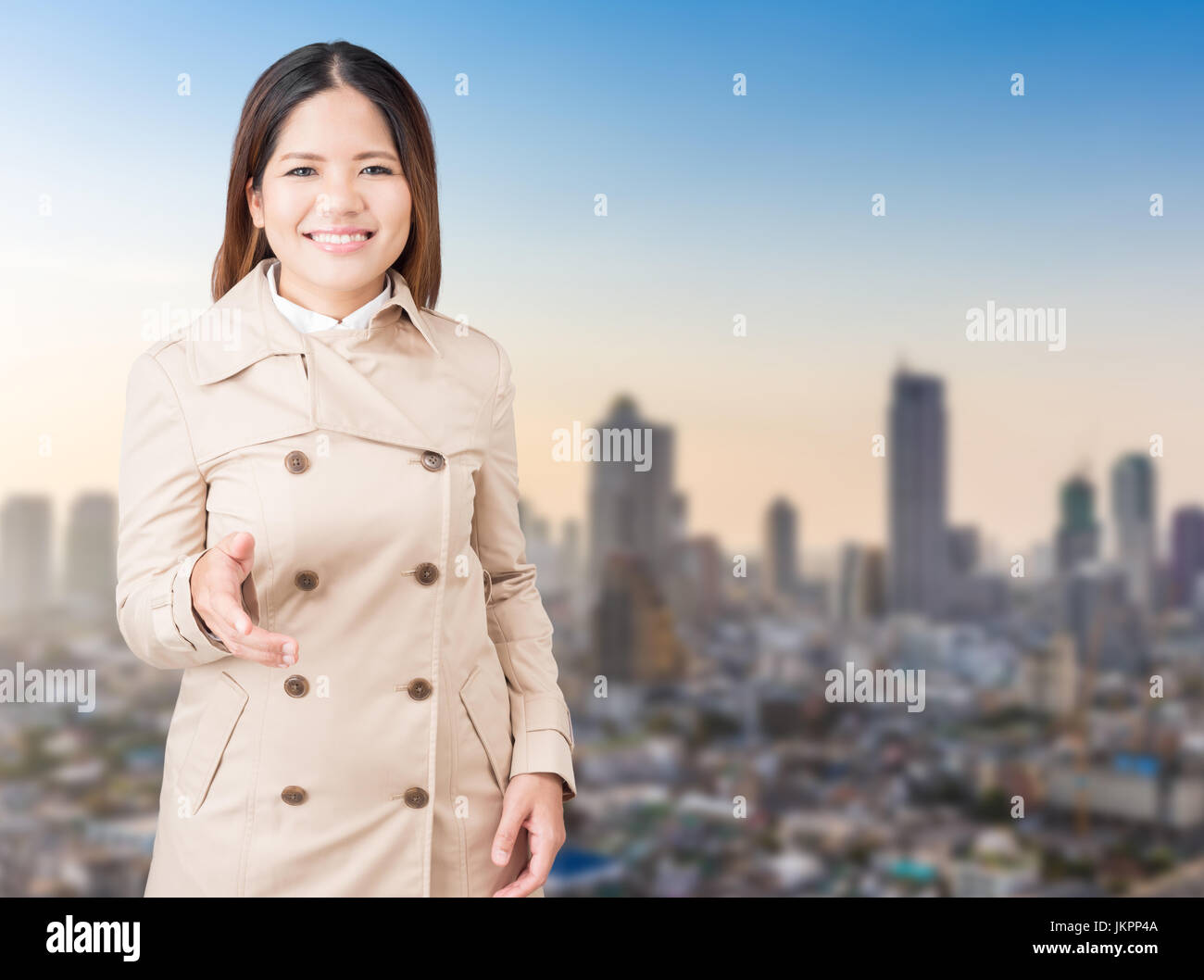 Extending hand woman wearing hi-res stock photography and images - Alamy