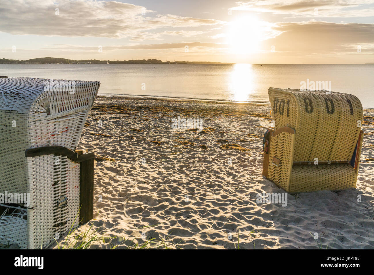European Beach wicker chairs are placed decoratively on the beach for ...