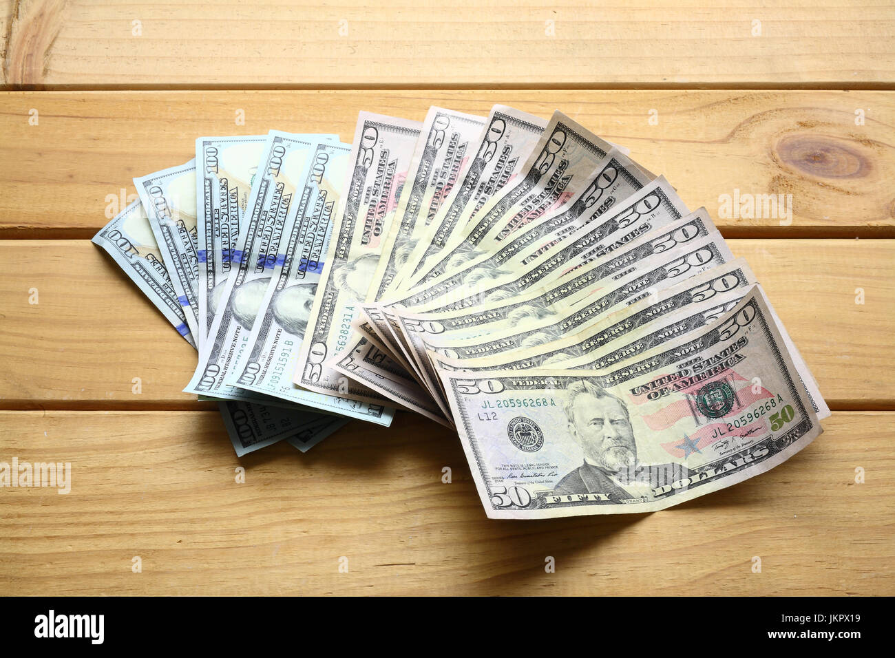 Bank Notes on Wooden Background Stock Photo - Alamy