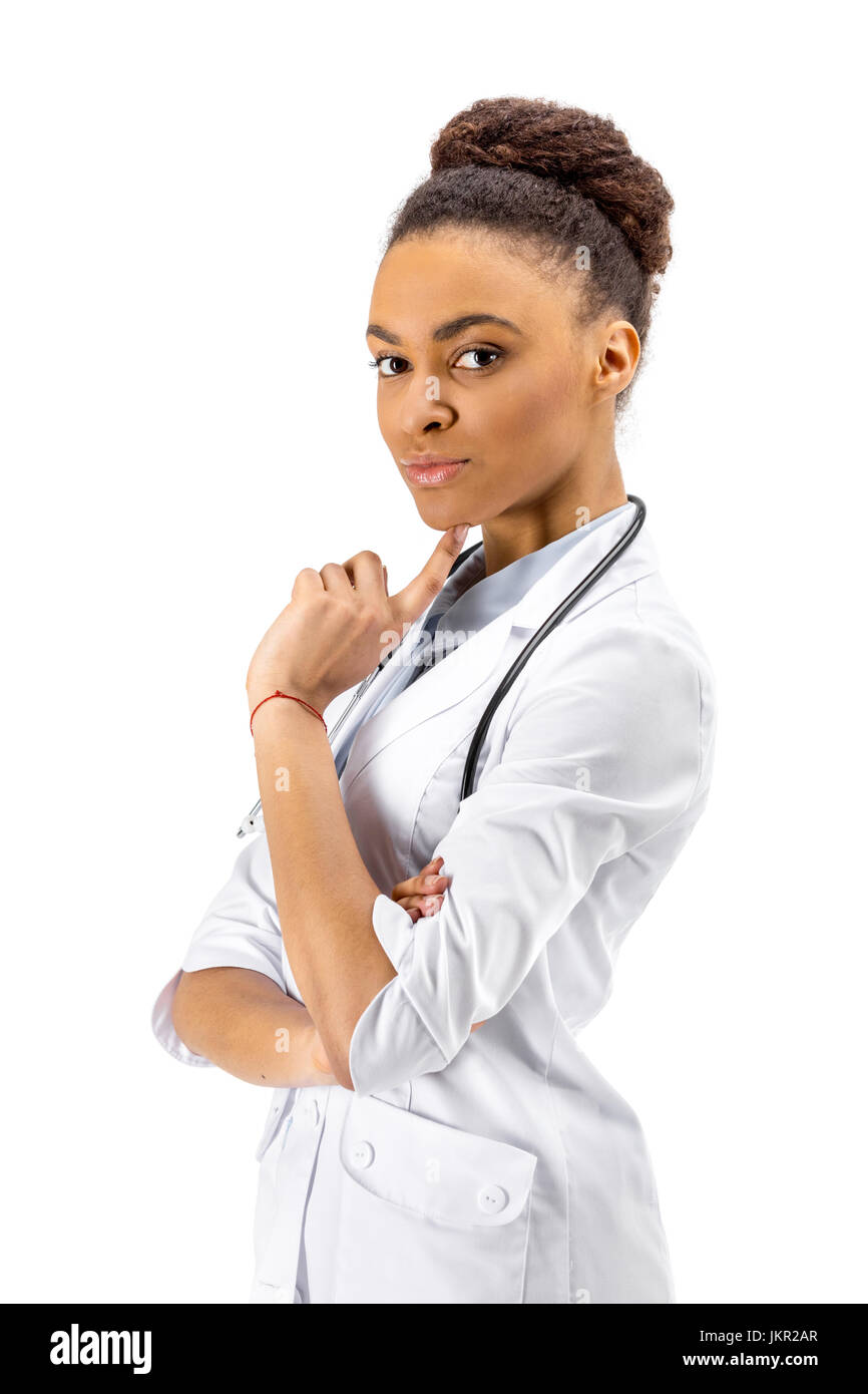 Beautiful young professional female doctor standing with stethoscope ...