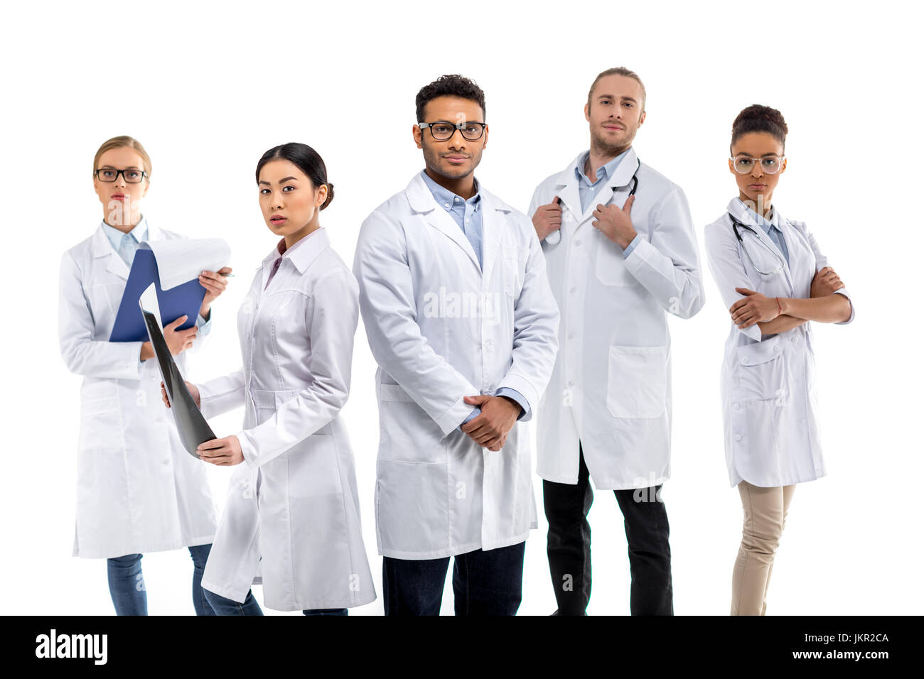 Group of young confident professional doctors standing together ...