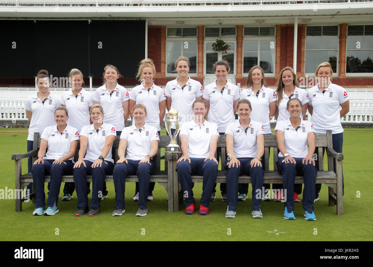 The England women cricket team pose with the World Cup trophy during a ...