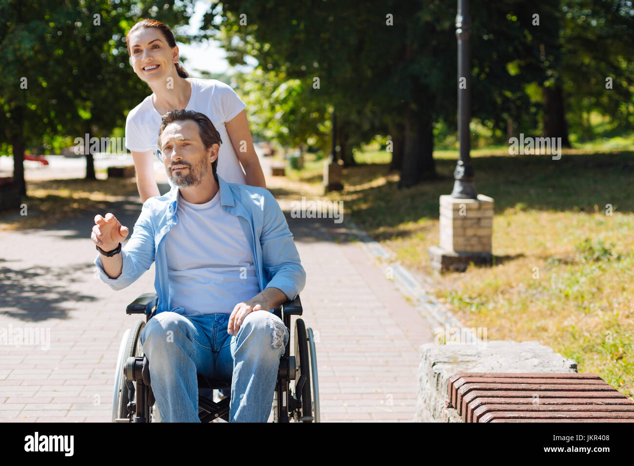 Bright energetic people spotting someone they know Stock Photo - Alamy