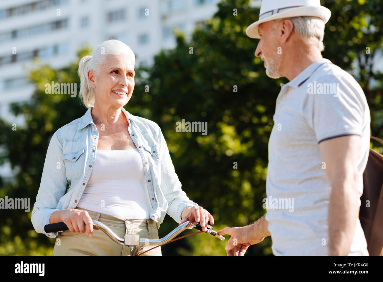 Attentive man speaking with his woman Stock Photo - Alamy