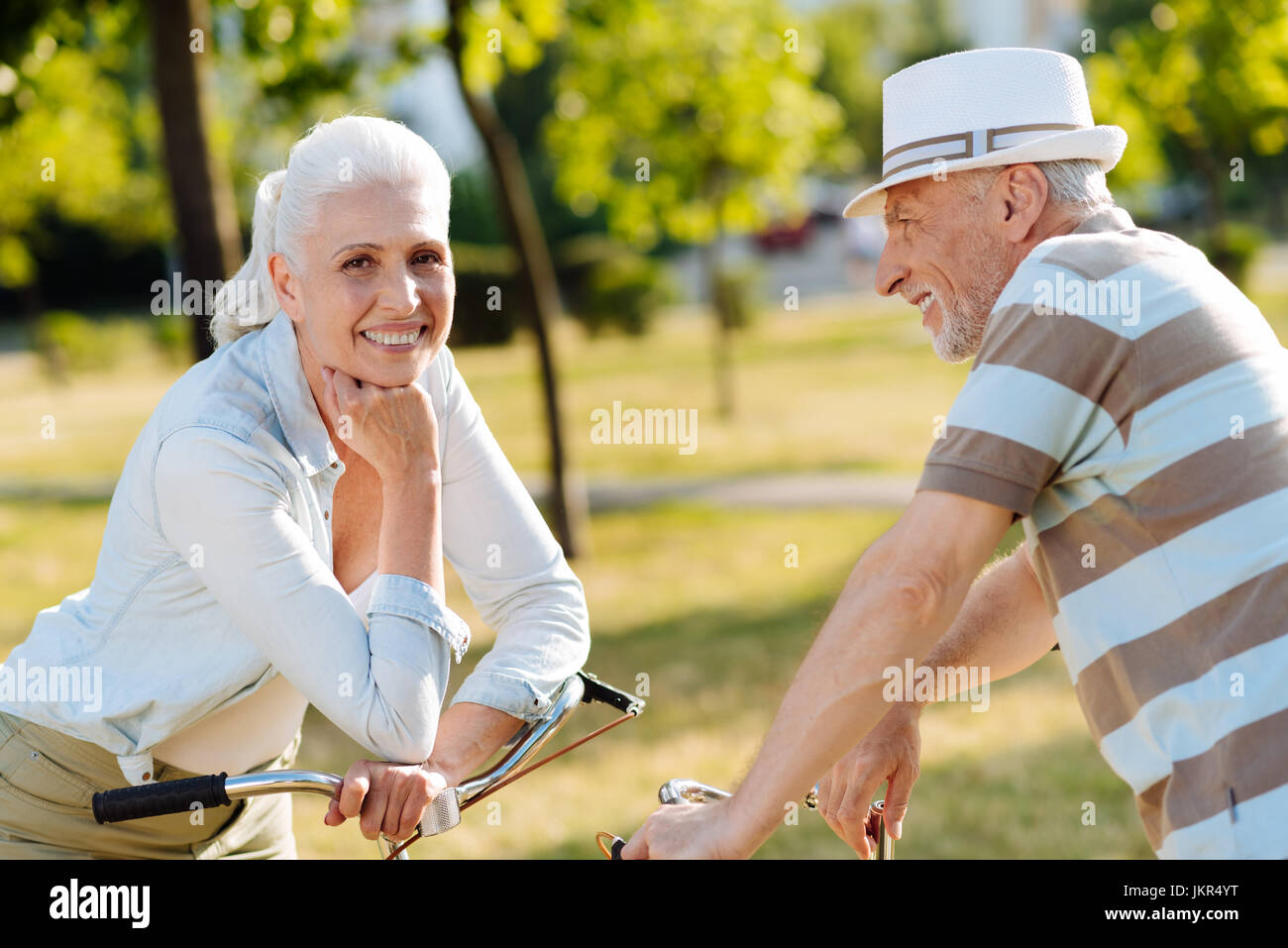 Attractive smiling female person posing on camera Stock Photo - Alamy