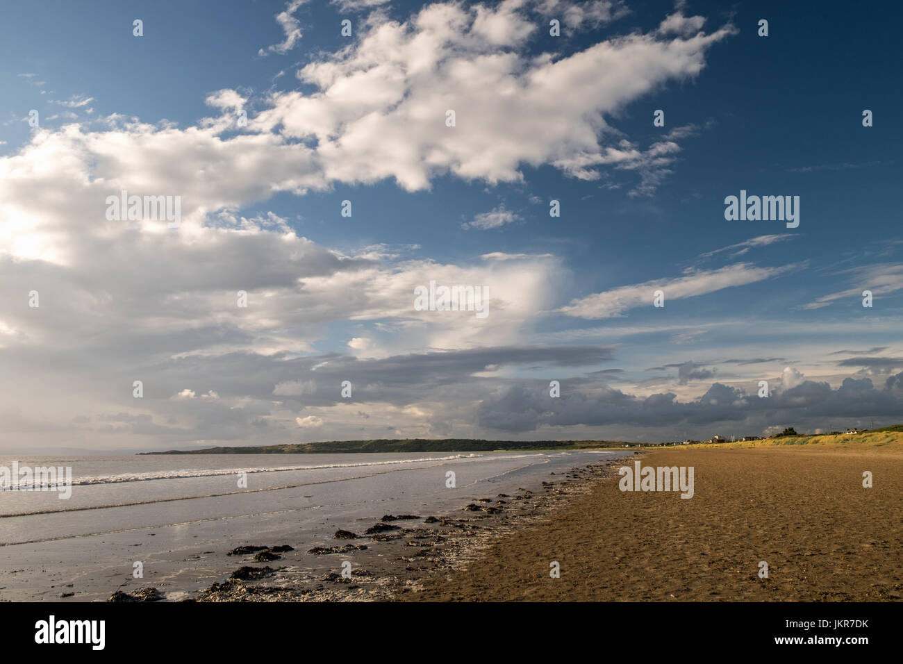 moody clouds and a beautiful beach Stock Photo - Alamy