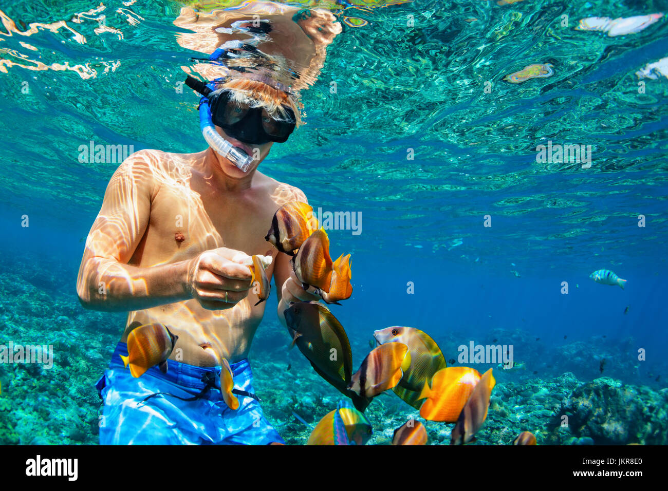 Happy family vacation - man in snorkeling mask dive underwater with ...
