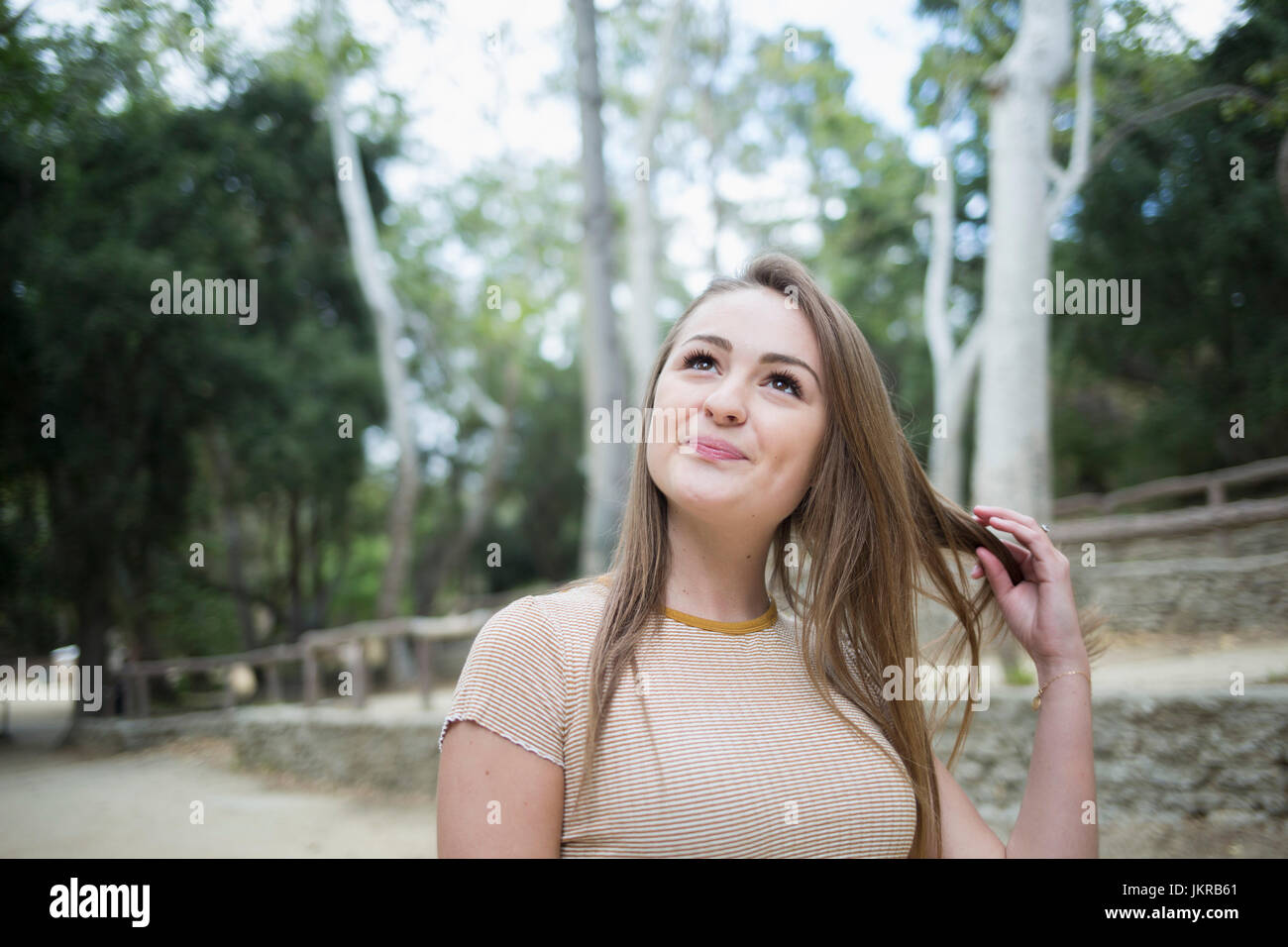Playing with hair hi-res stock photography and images - Alamy
