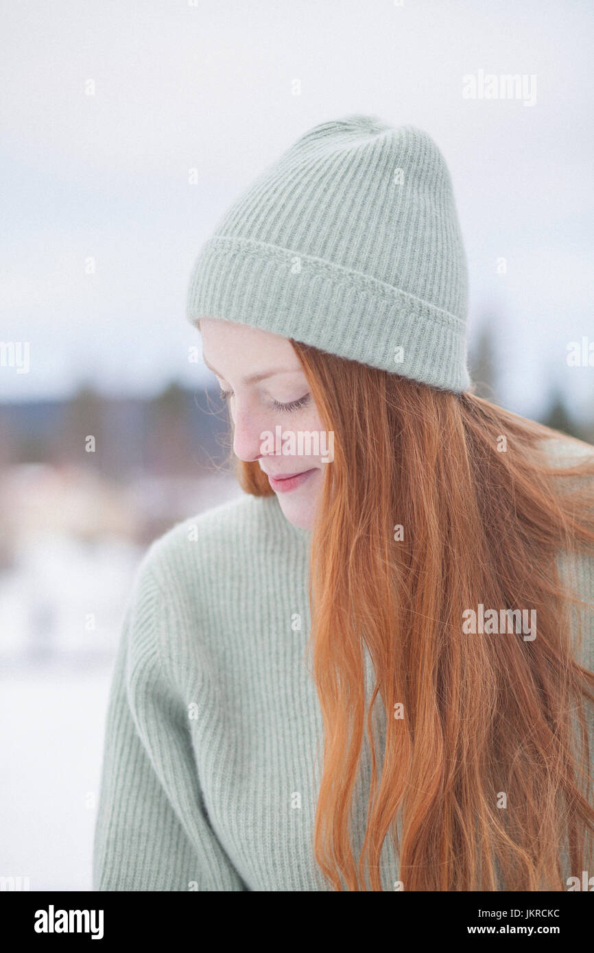 Redhead woman wearing sweater hi-res stock photography and images - Alamy
