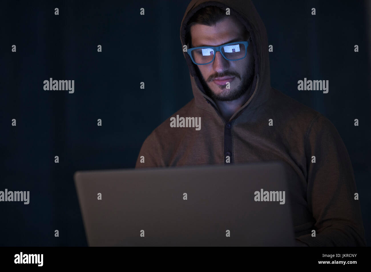 Hacker using white laptop hi-res stock photography and images - Alamy