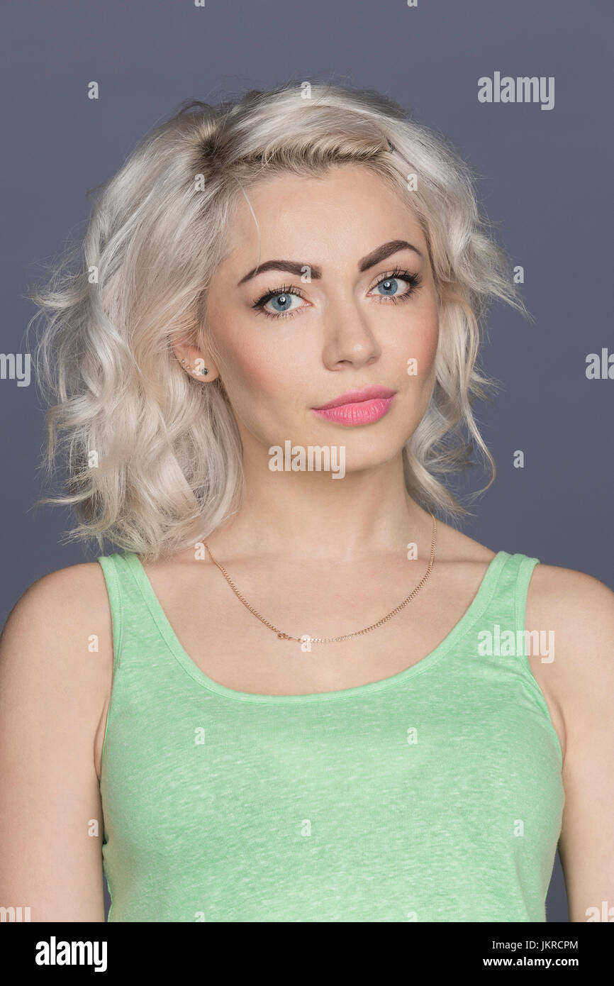 Beautiful young woman wearing tank hi-res stock photography and images ...