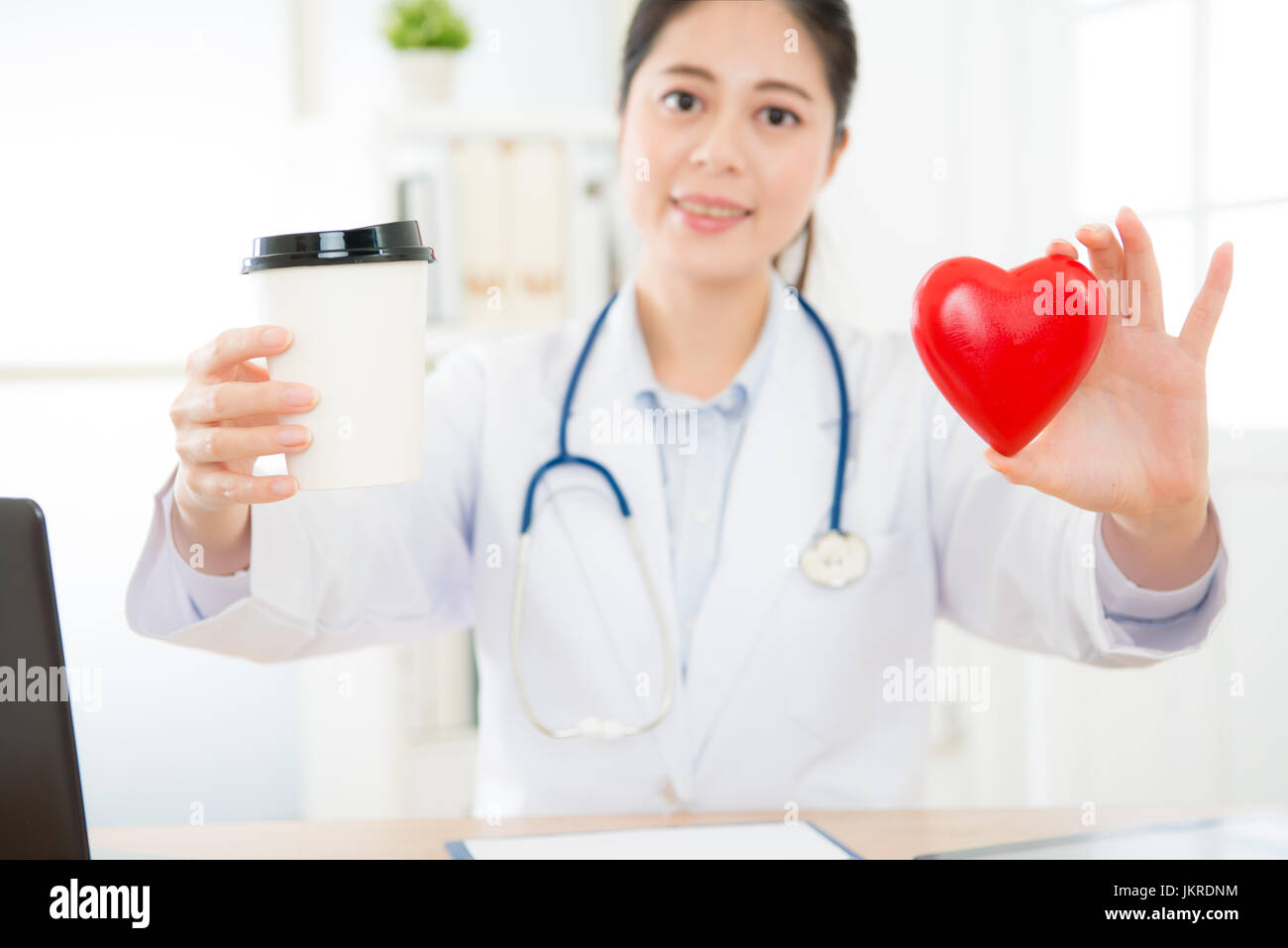 coffee cup and heart model showing caffeine causing people getting ...