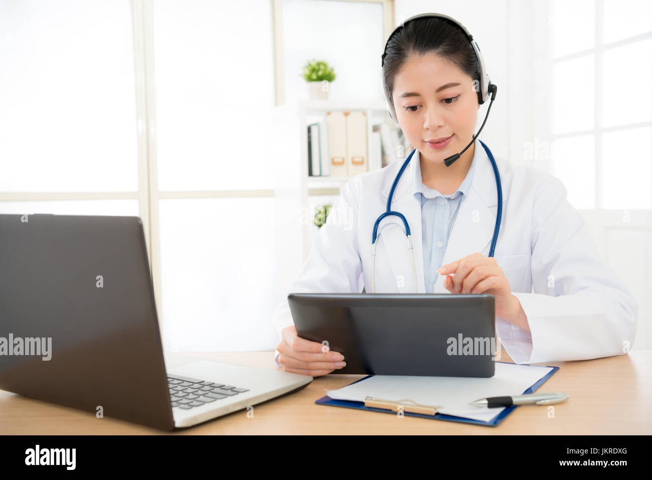 beautiful female medicine doctor explain diagnosis to patient by online ...