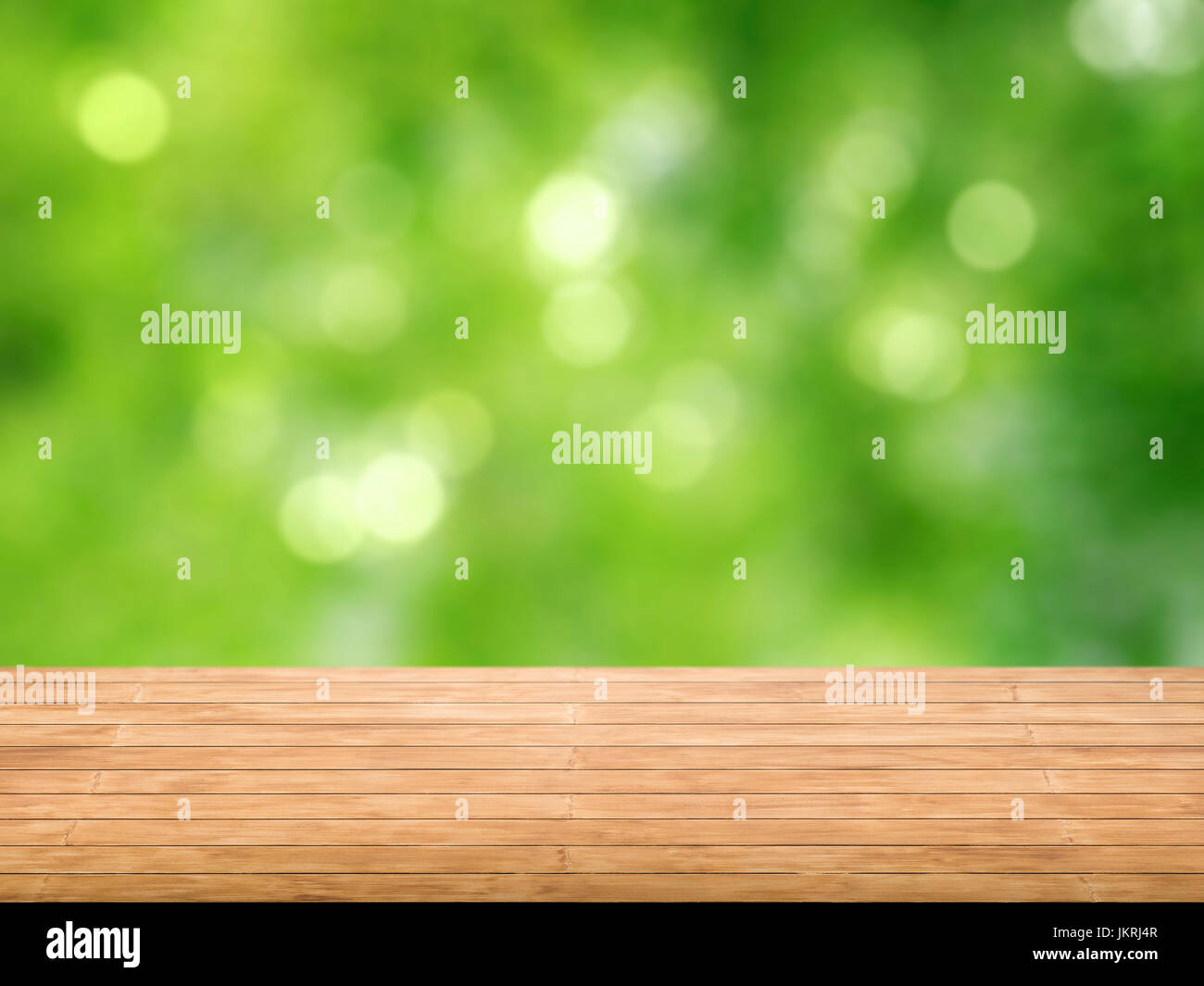 wooden counter on green background Stock Photo - Alamy