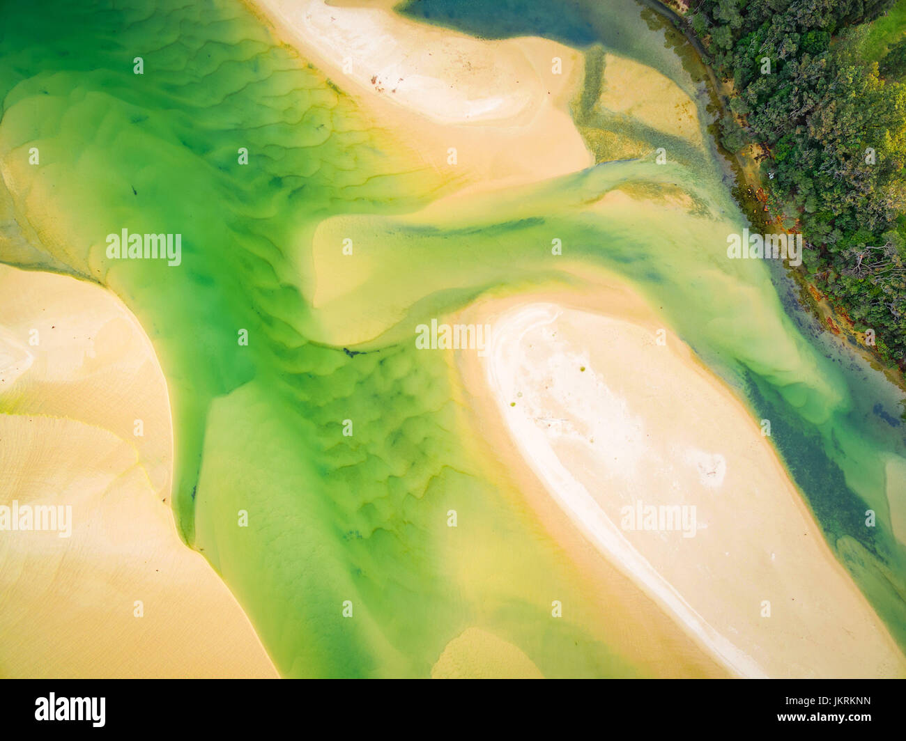 Aerial view of shallow turquoise ocean water at low tide Stock Photo ...