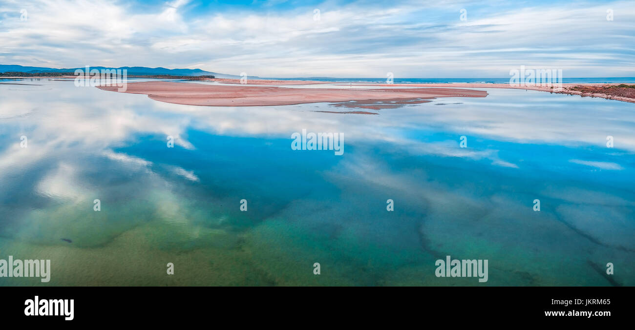 Aerial panorama landscape - beautiful sky reflecting in shallow ocean ...