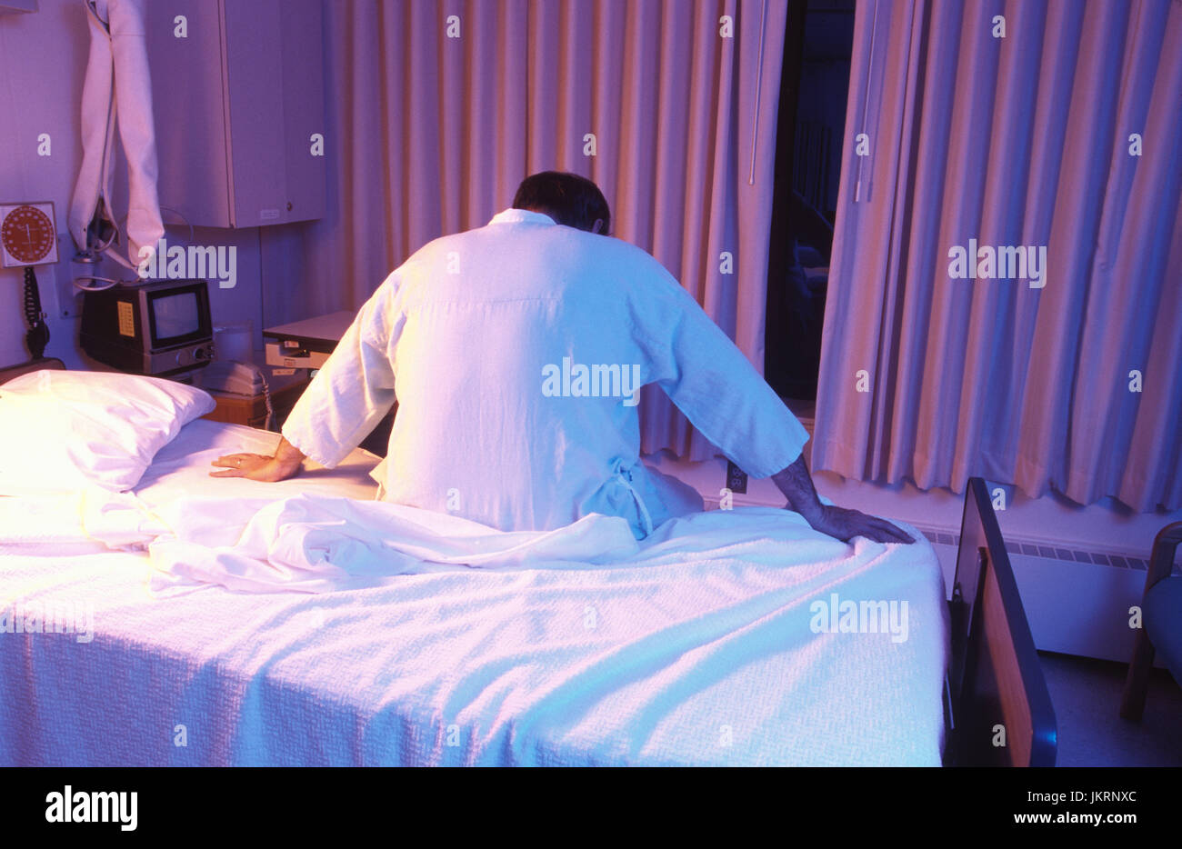 A patient thinking in his hospital bed Stock Photo - Alamy