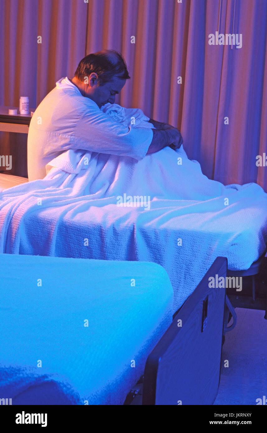 A patient thinking in his hospital bed Stock Photo - Alamy