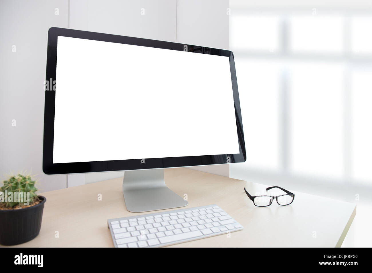 young man working Businessman using a desktop computer of the blank ...