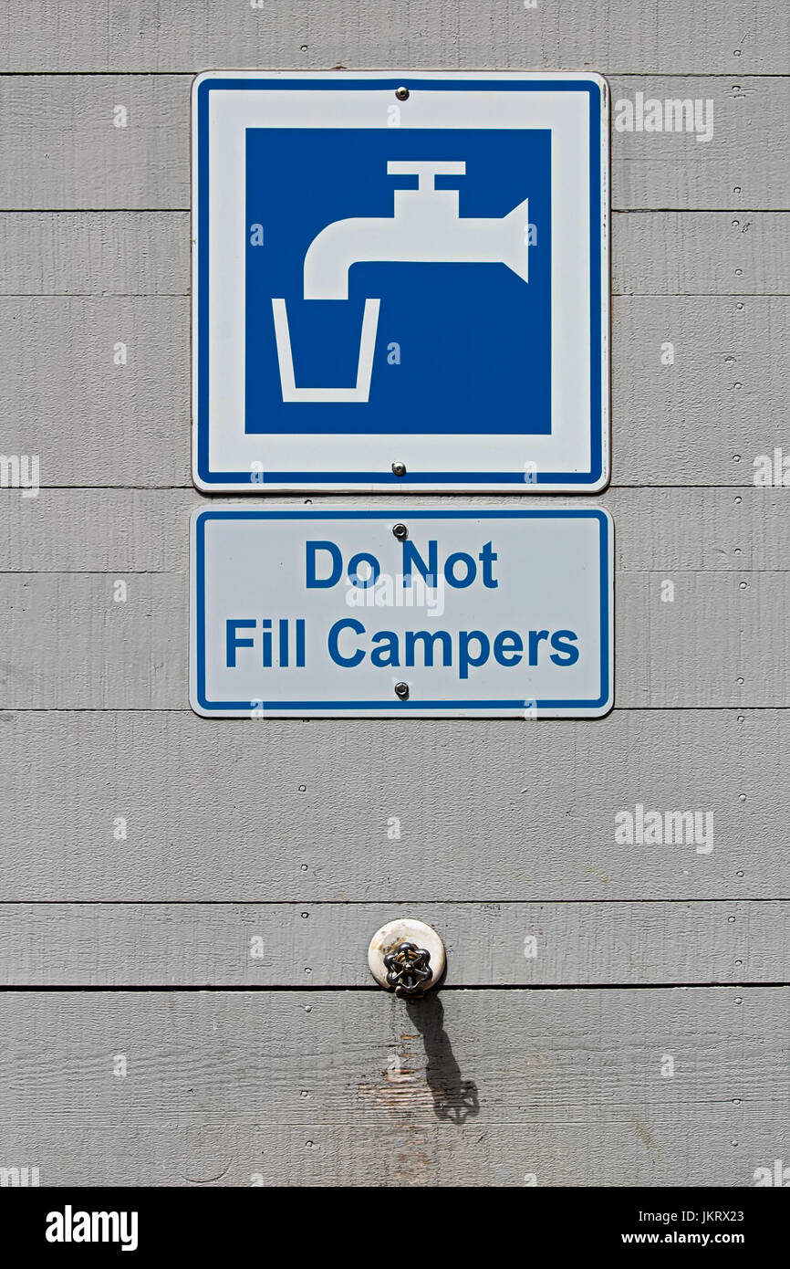 A do not fill campers waring sign near a tap Stock Photo - Alamy