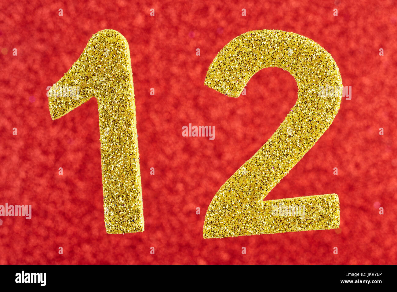 Number twelve yellow color over a red background. Anniversary ...