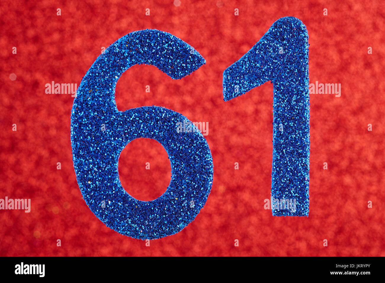 Number sixty-one blue color over a red background. Anniversary ...