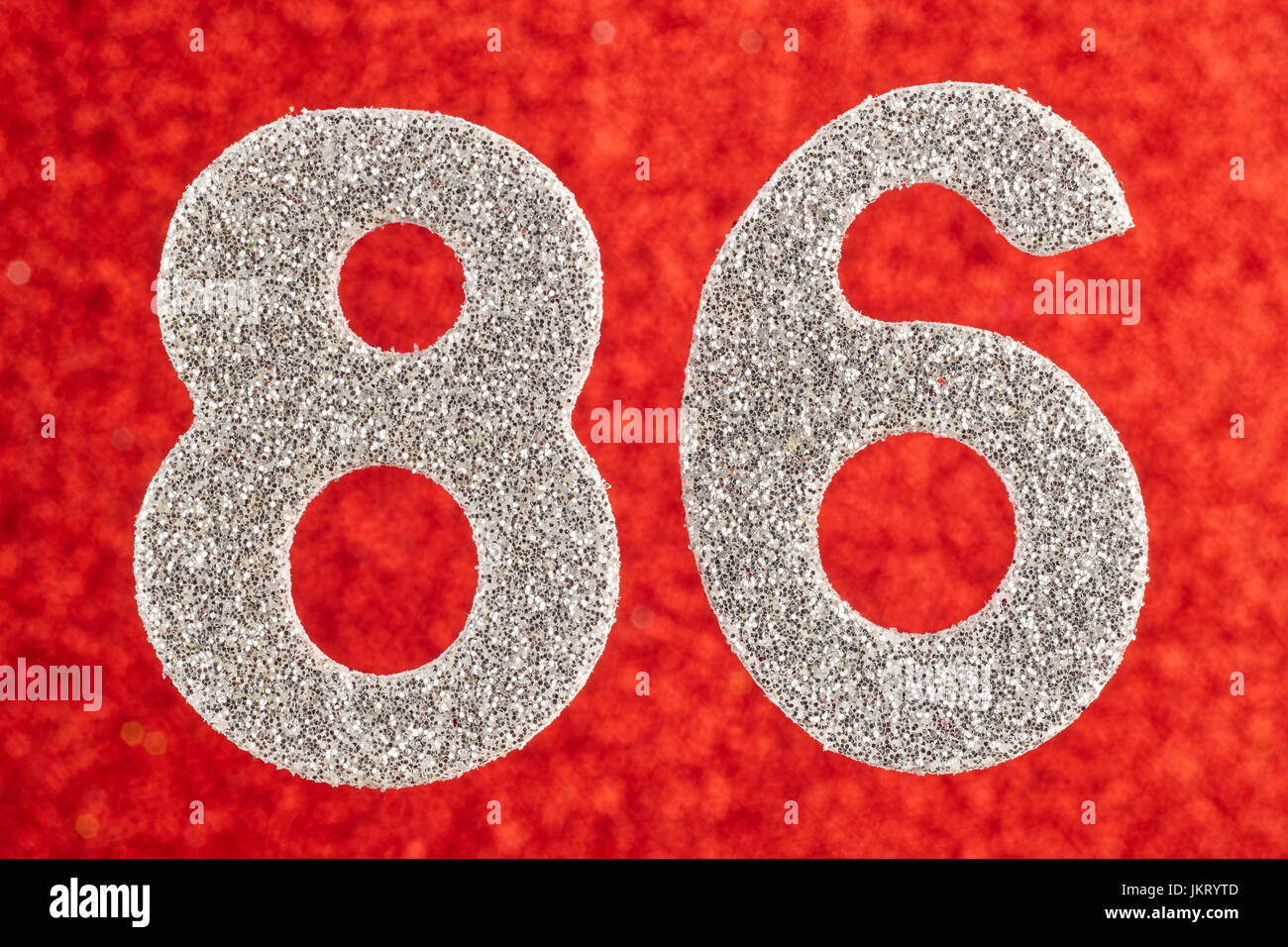 Number eighty-six silver color over a red background. Anniversary ...