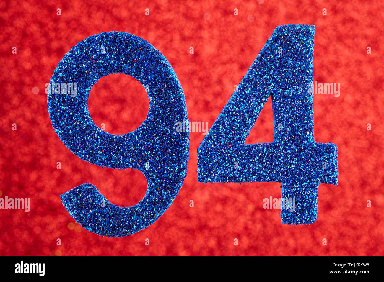 Number ninety-four blue color over a red background. Anniversary ...