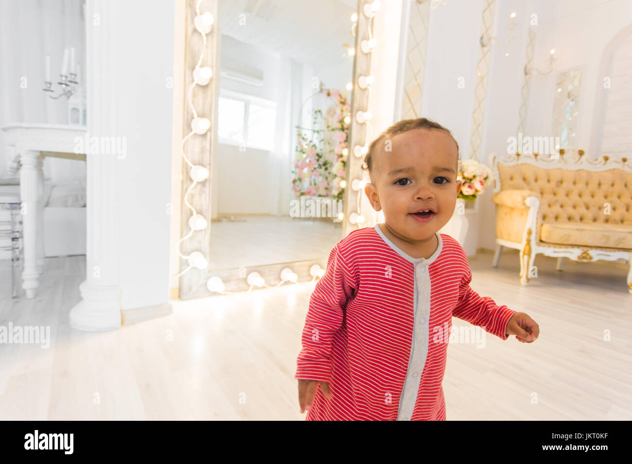 Cute baby making a funny surprised face Stock Photo - Alamy