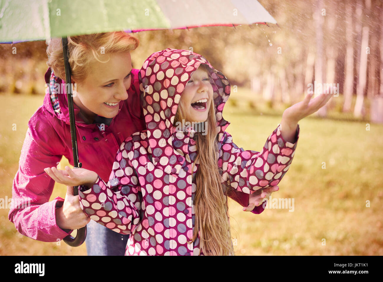 Rainy weather but we are so happy Stock Photo - Alamy
