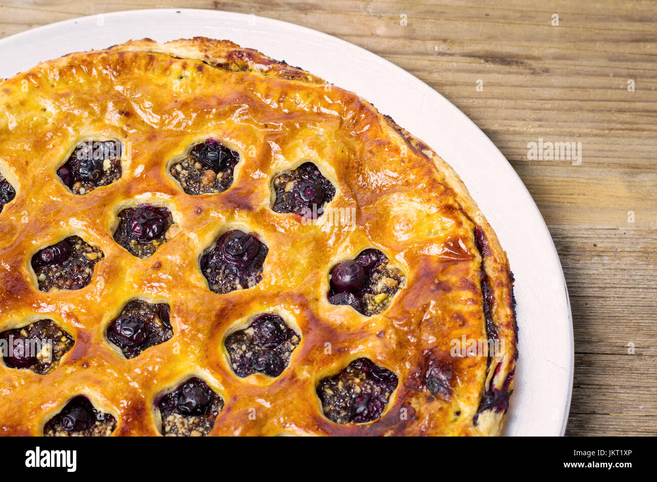 Homemade berry fruit sweet pie with golden crust Stock Photo - Alamy