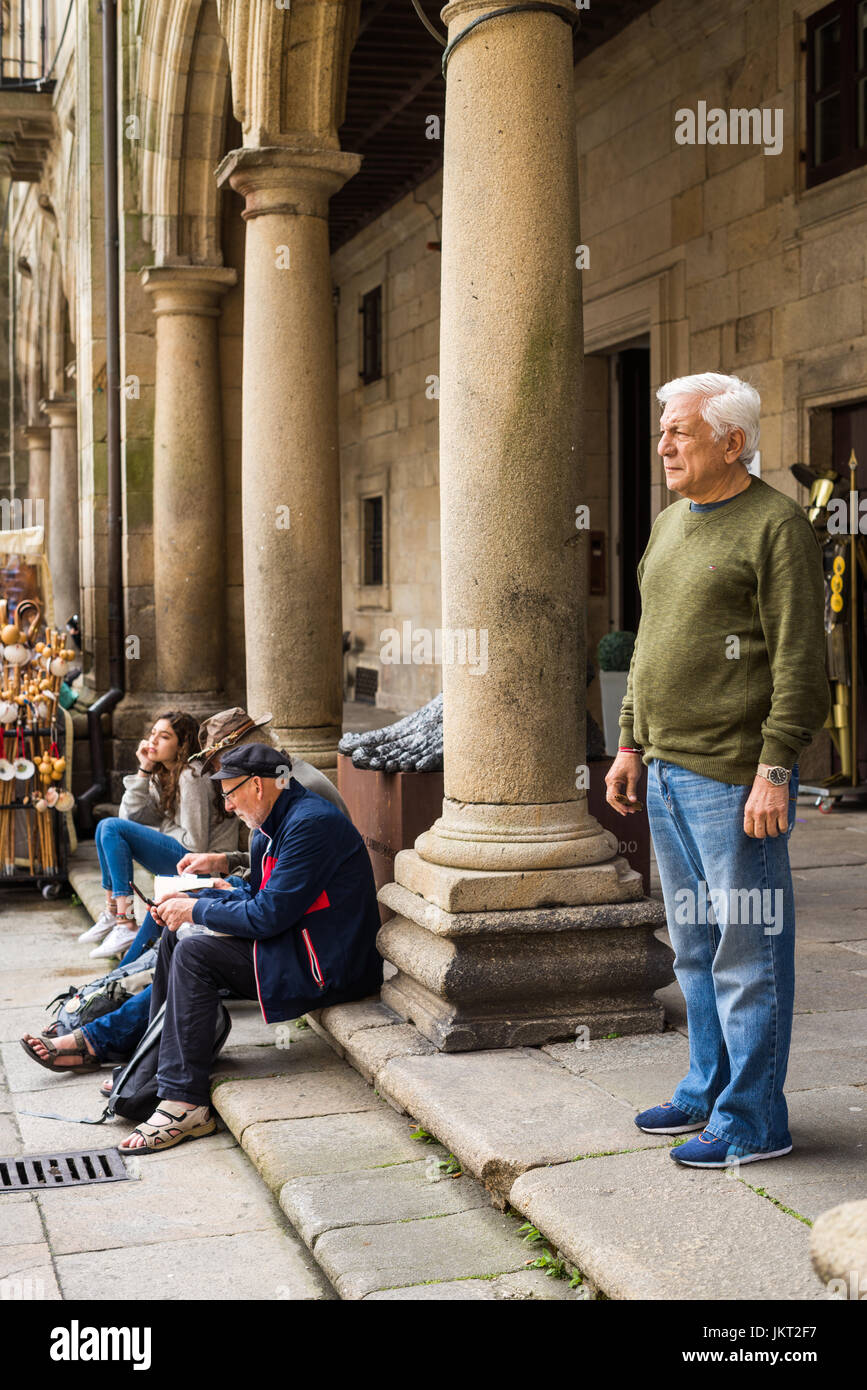 Local people, tourists or pilgrims in the street of the Santiago de ...