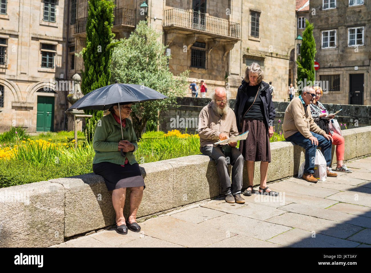 Local people, tourists or pilgrims in the street of the Santiago de ...