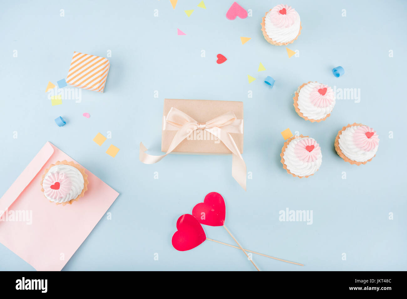 top view of cakes and gift boxes with envelope mock-up, birthday party ...