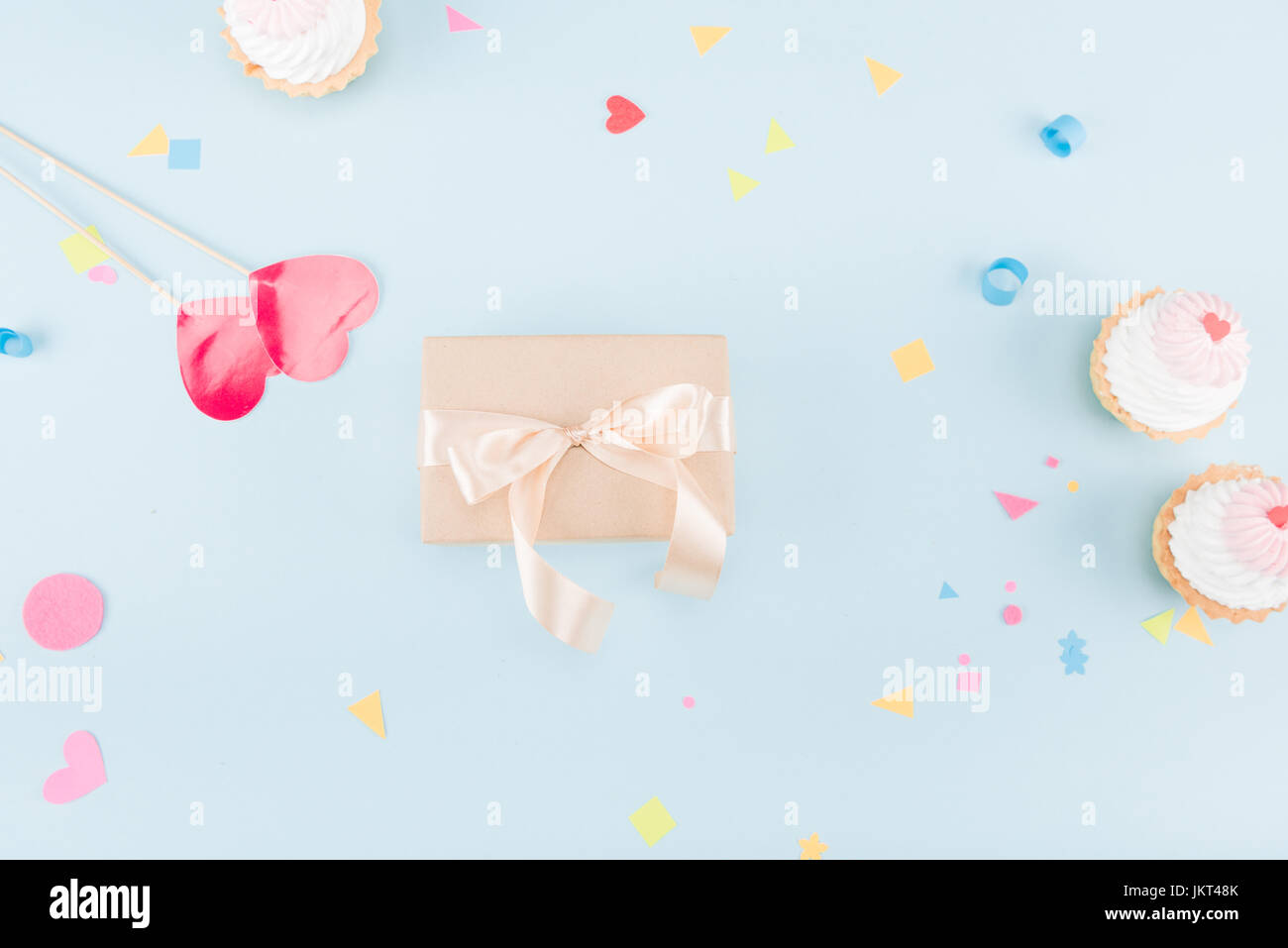 top view of cakes and gift box with ribbon mock-up, birthday party ...