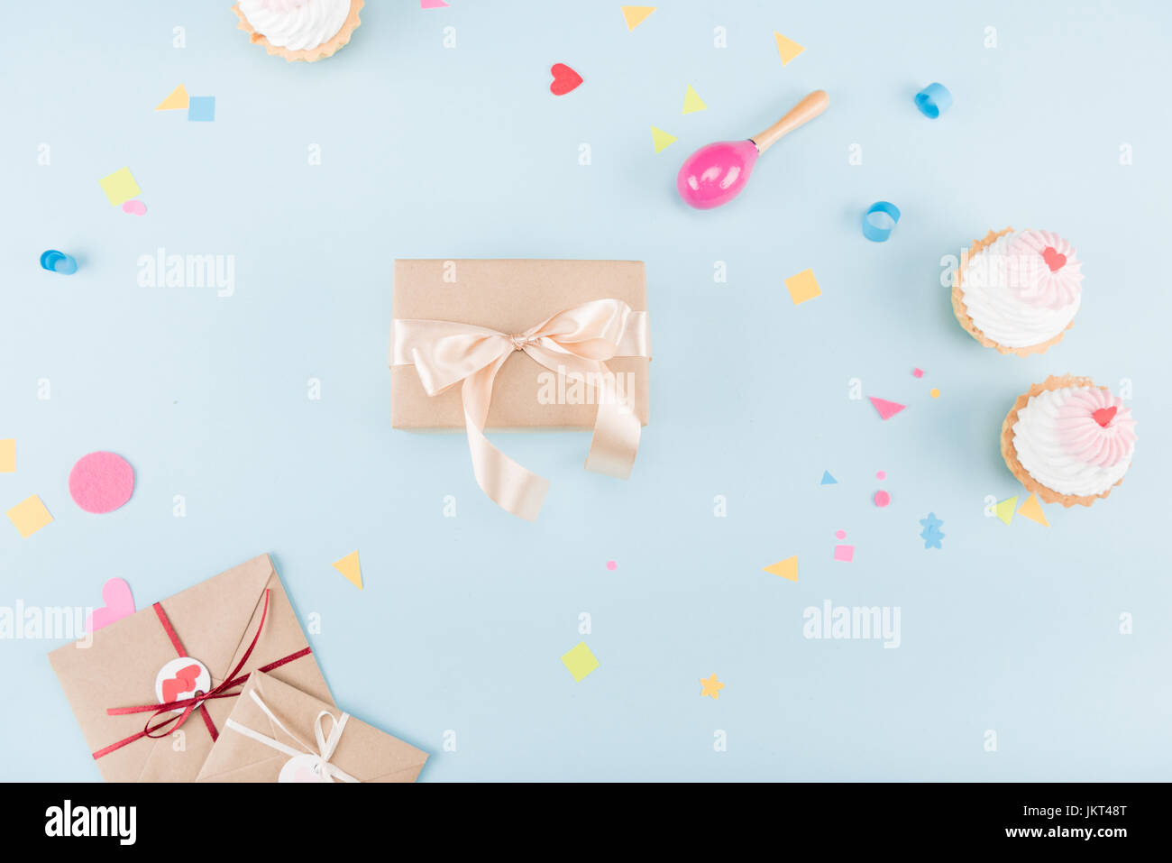 top view of cakes with gift boxes and beanbag mock-up, birthday party ...