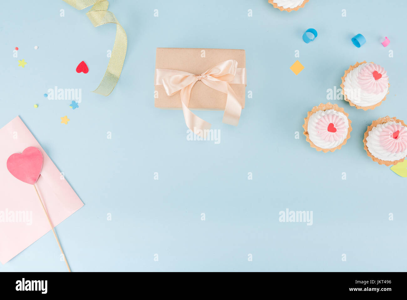 top view of cakes and gift box with ribbons mock-up, birthday party ...