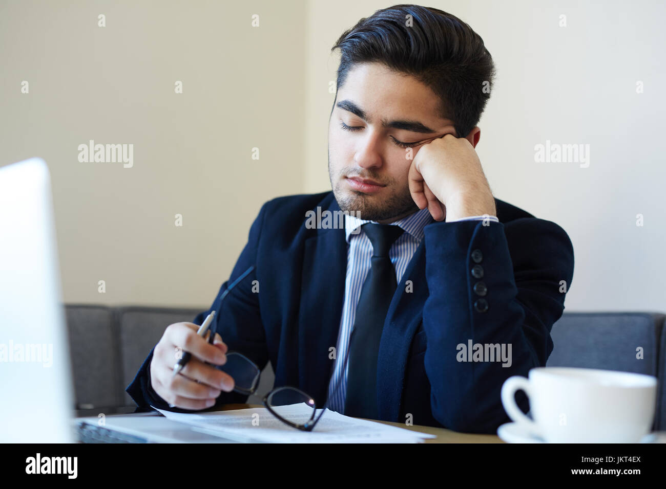 Workplace napping hi-res stock photography and images - Alamy