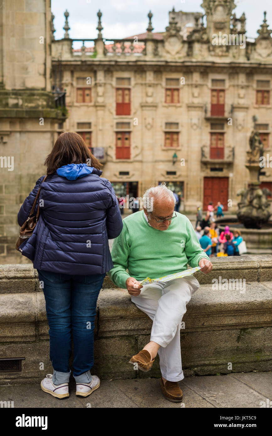 Local people, tourists or pilgrims in the street of the Santiago de ...
