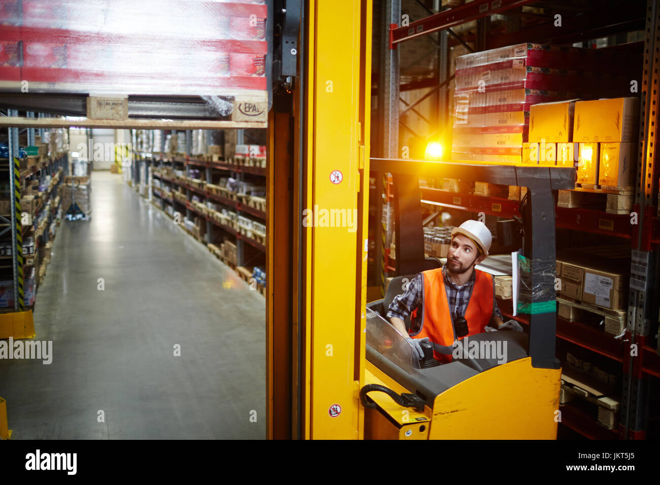 Warehouse high rack forklift hi-res stock photography and images - Alamy