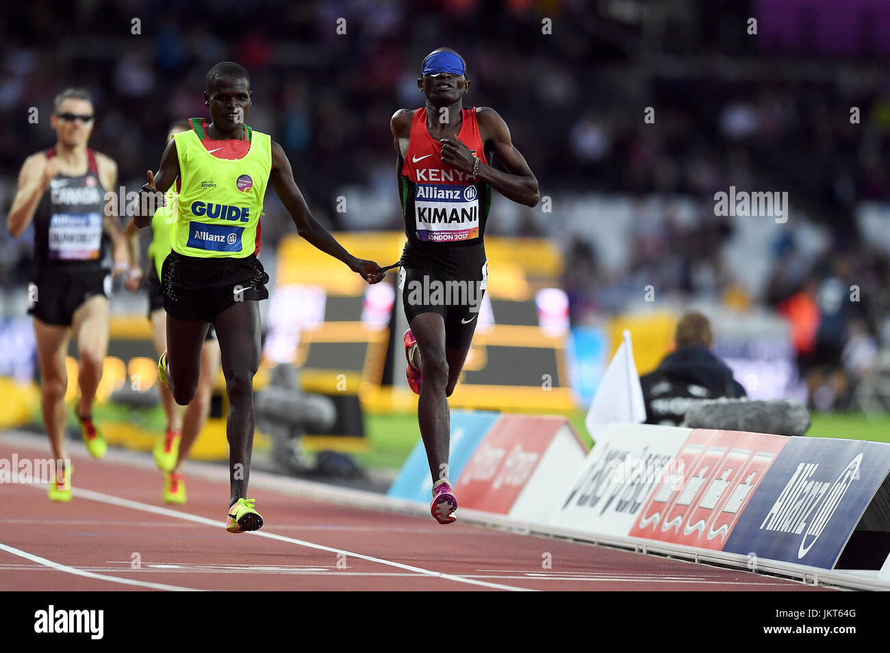 Kenya's Samuel Mushai Kimani and guide James Boit win the Men's 1500m ...