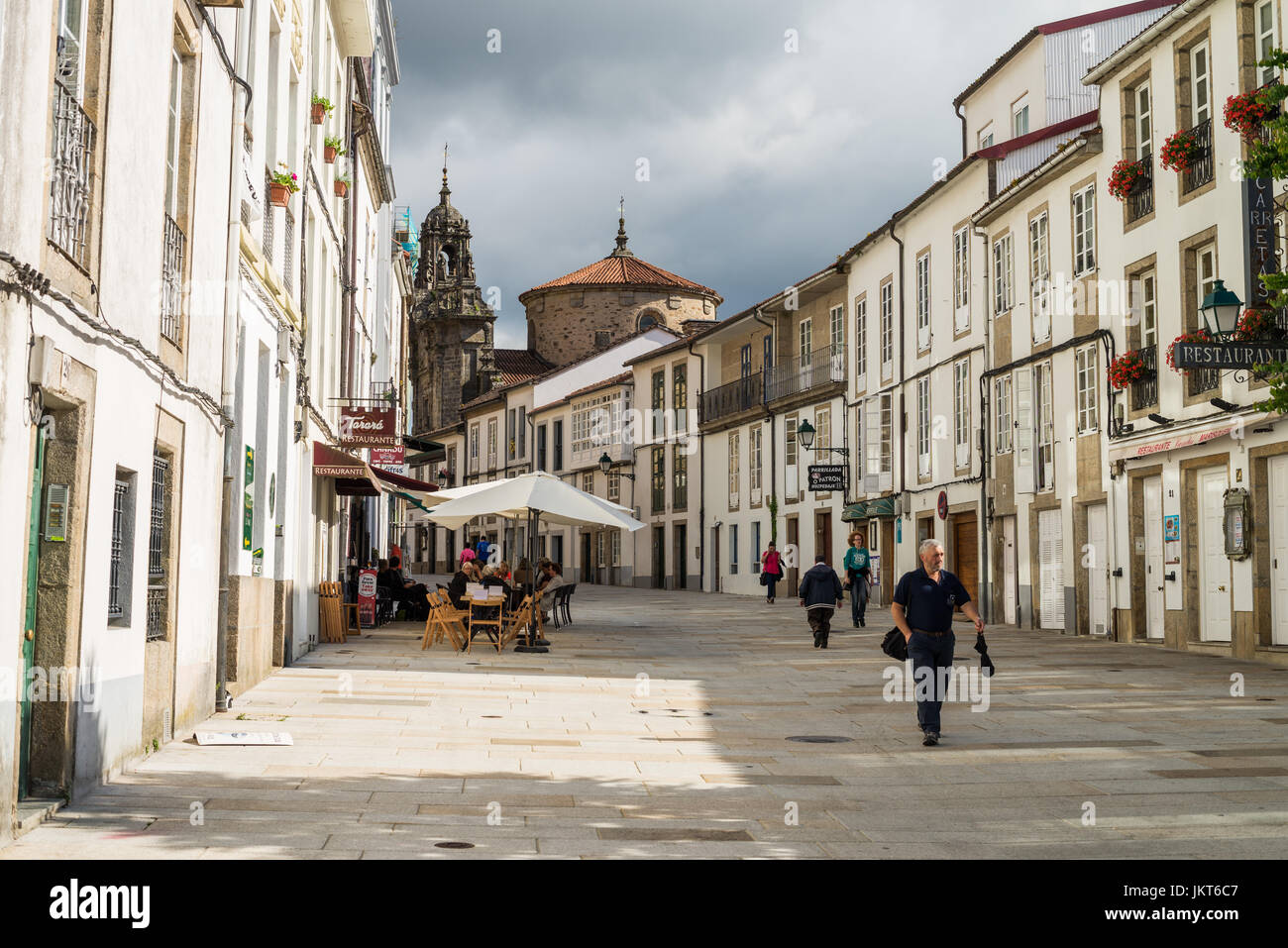 Local people, tourists or pilgrims in the street of the Santiago de ...