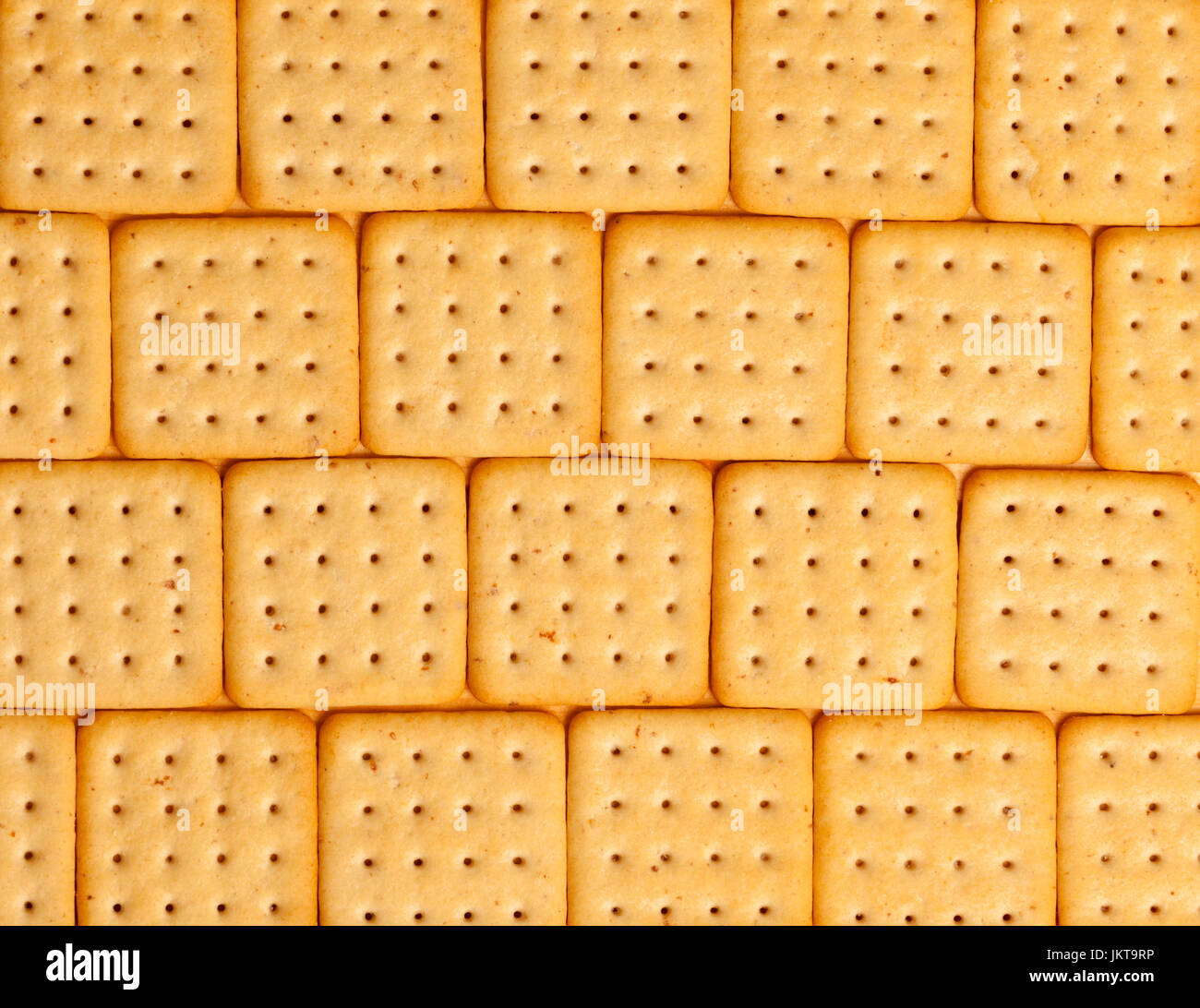 Yellow rectangular cracker background Stock Photo - Alamy
